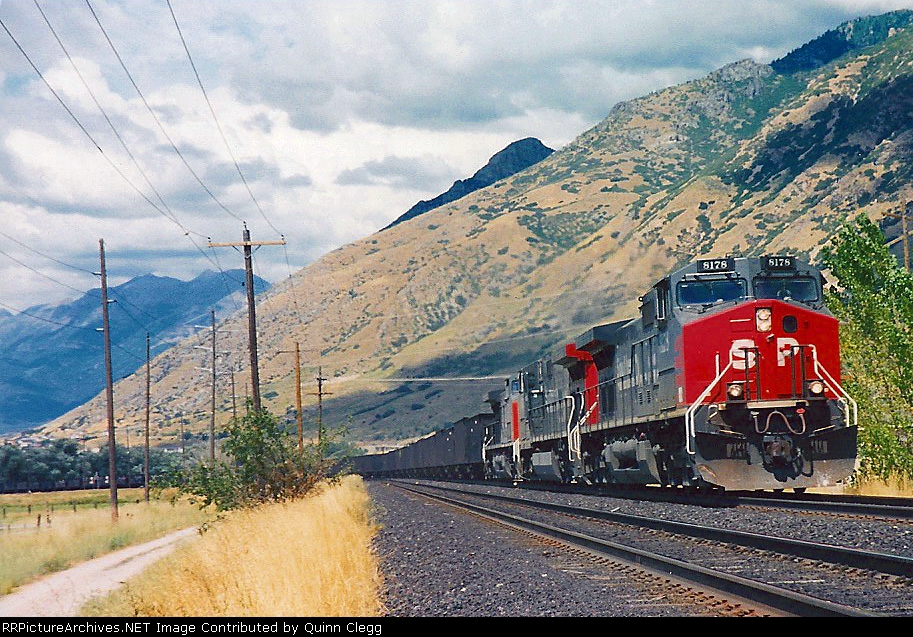 SOUTHERN PACIFIC'S GENEVA STEEL-SAVAGE MINE COAL EMPTIES.